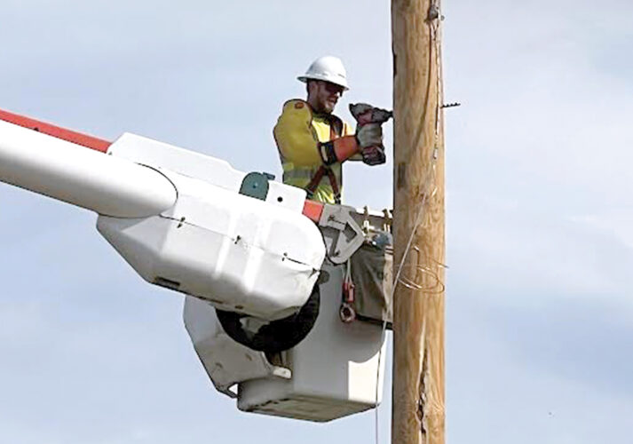 Drilling into Power Pole | News, Sports, Jobs - The Intermountain